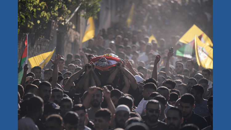 Palestinian man is shot and killed at a West Bank barrier near ...