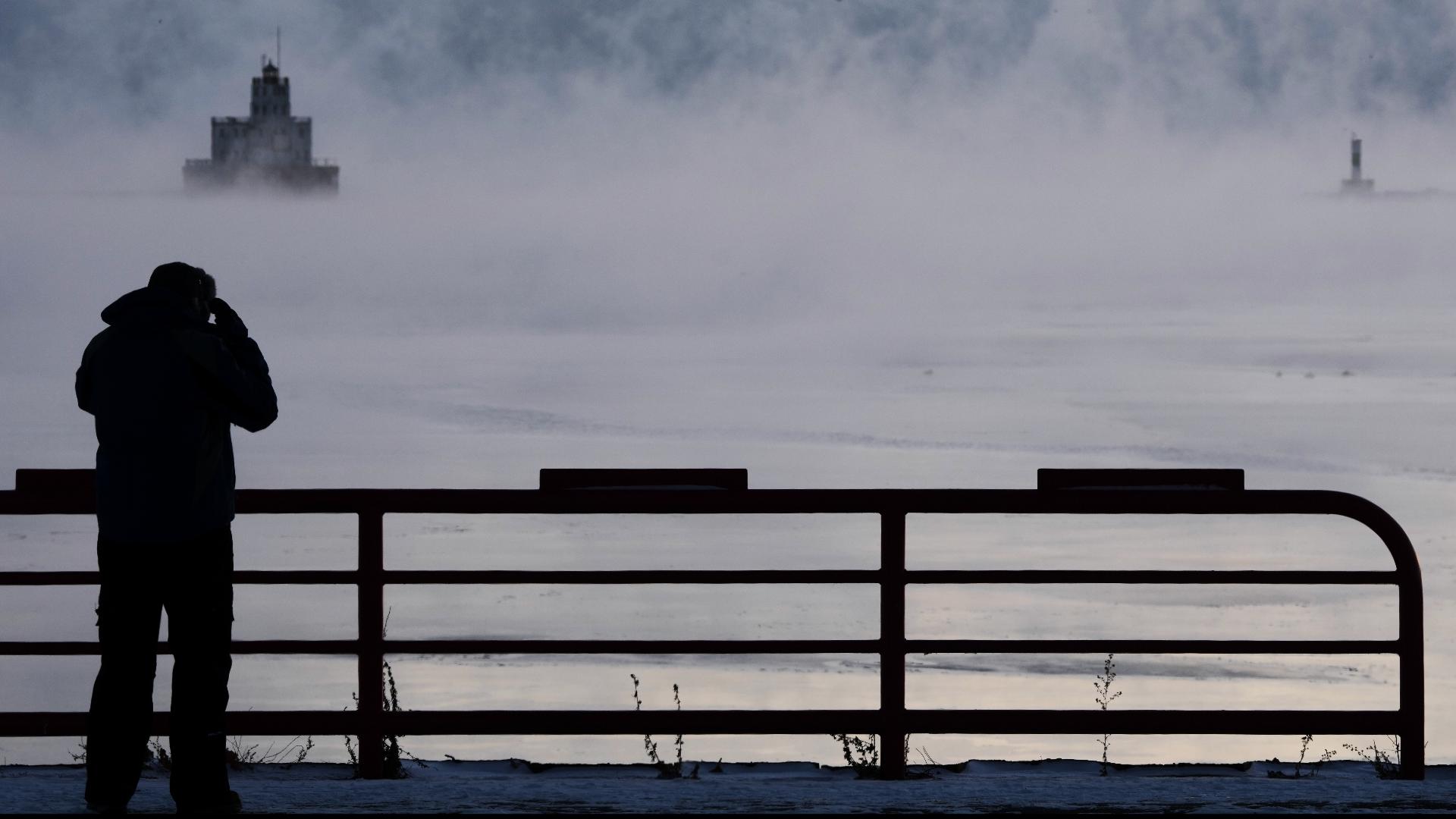 Power outages, extreme cold, 13K flights canceled as dayslong winter ...