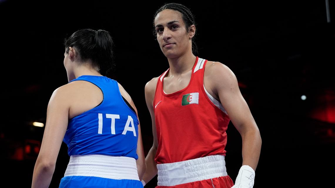 Boxer with gender test issues wins first match, opponent quits ...