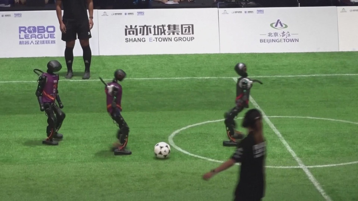 Humanoid robots compete in soccer match in China using AI software | newscentermaine.com