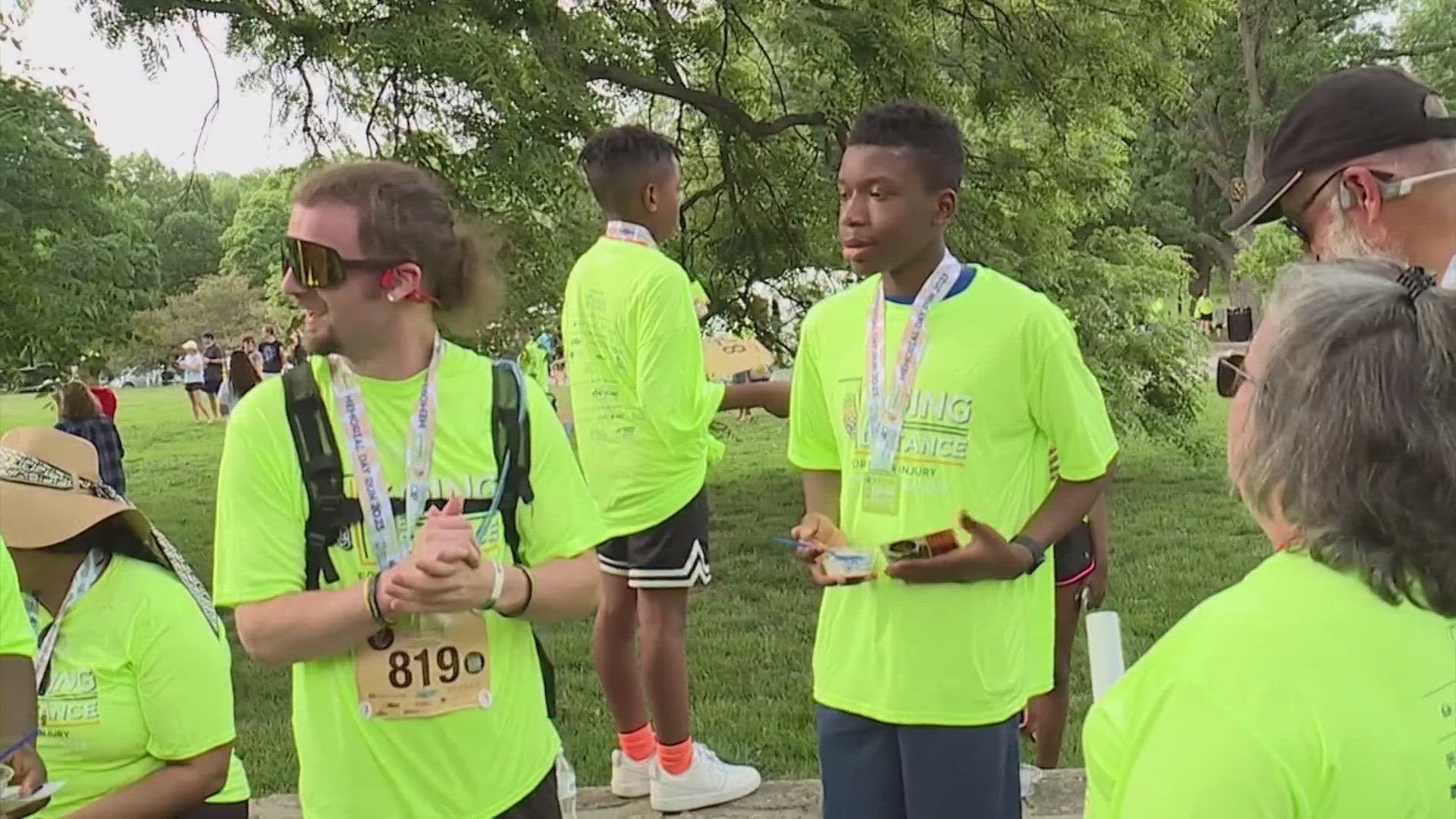 Teenager walks at brain injury event weeks after getting shot in head ...