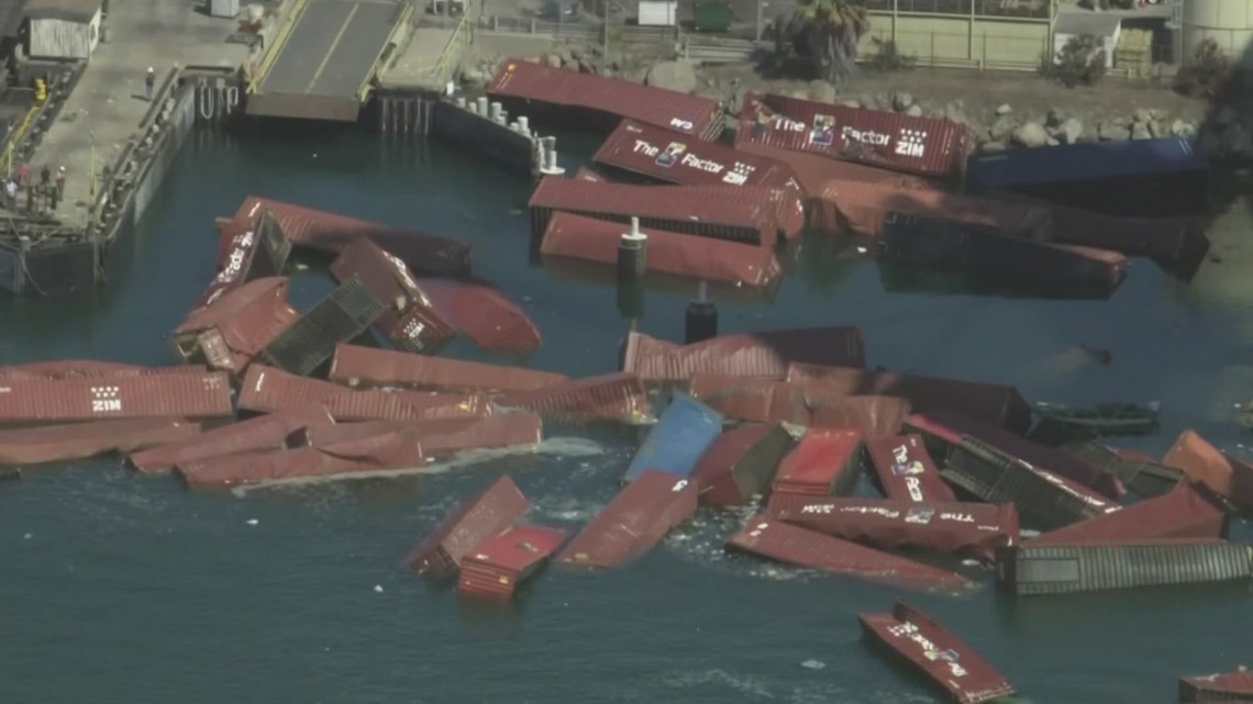 Watch: 67 shipping containers fall off a docked cargo ship in ...