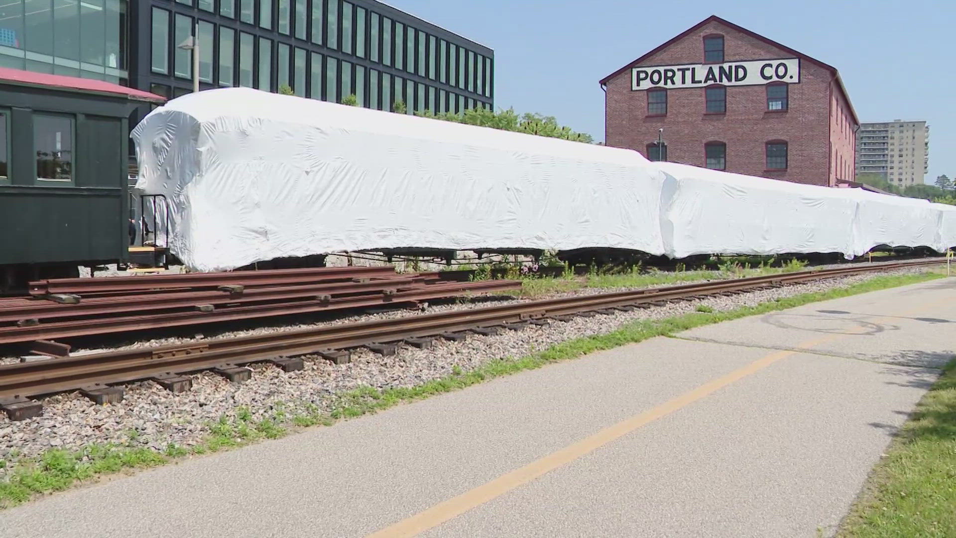 Developers call train cars an eyesore amid Eastern Prom project in ...