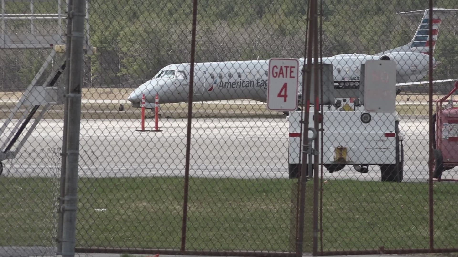 Airplane gets stuck in the mud at Bangor International Airport ...