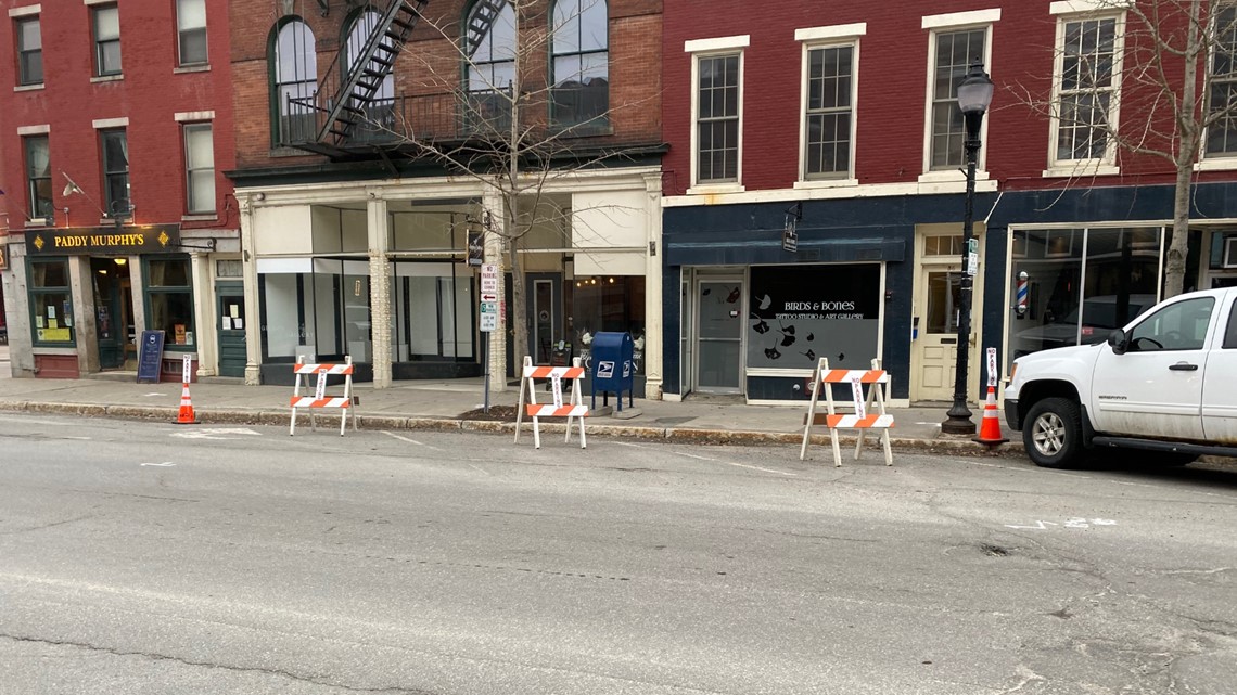 Sinkhole in downtown Bangor causes parking spaces to close ...