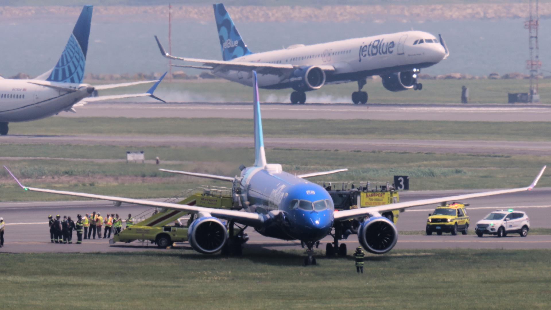 JetBlue flight landing in Boston rolls off runway and into grass ...