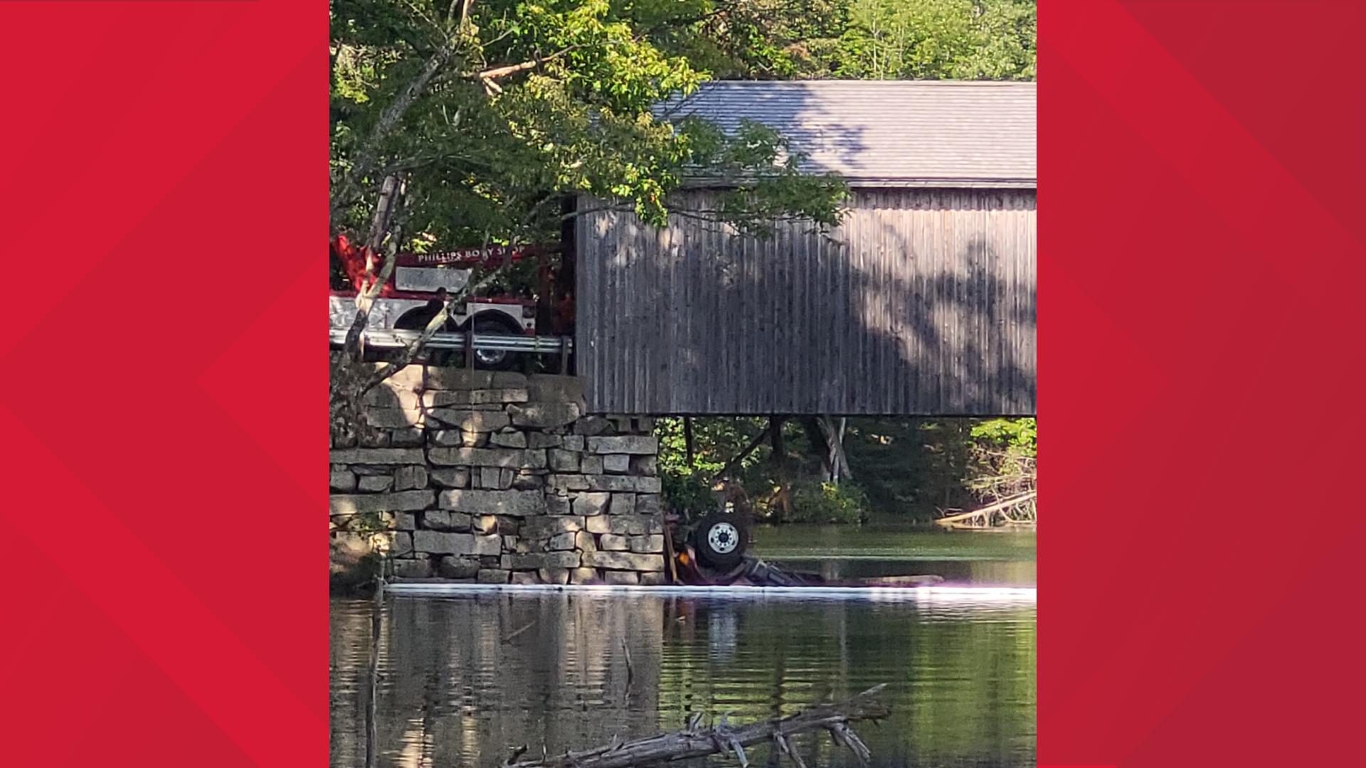 Dump Truck Falls Through Covered Bridge Into River In Gorham