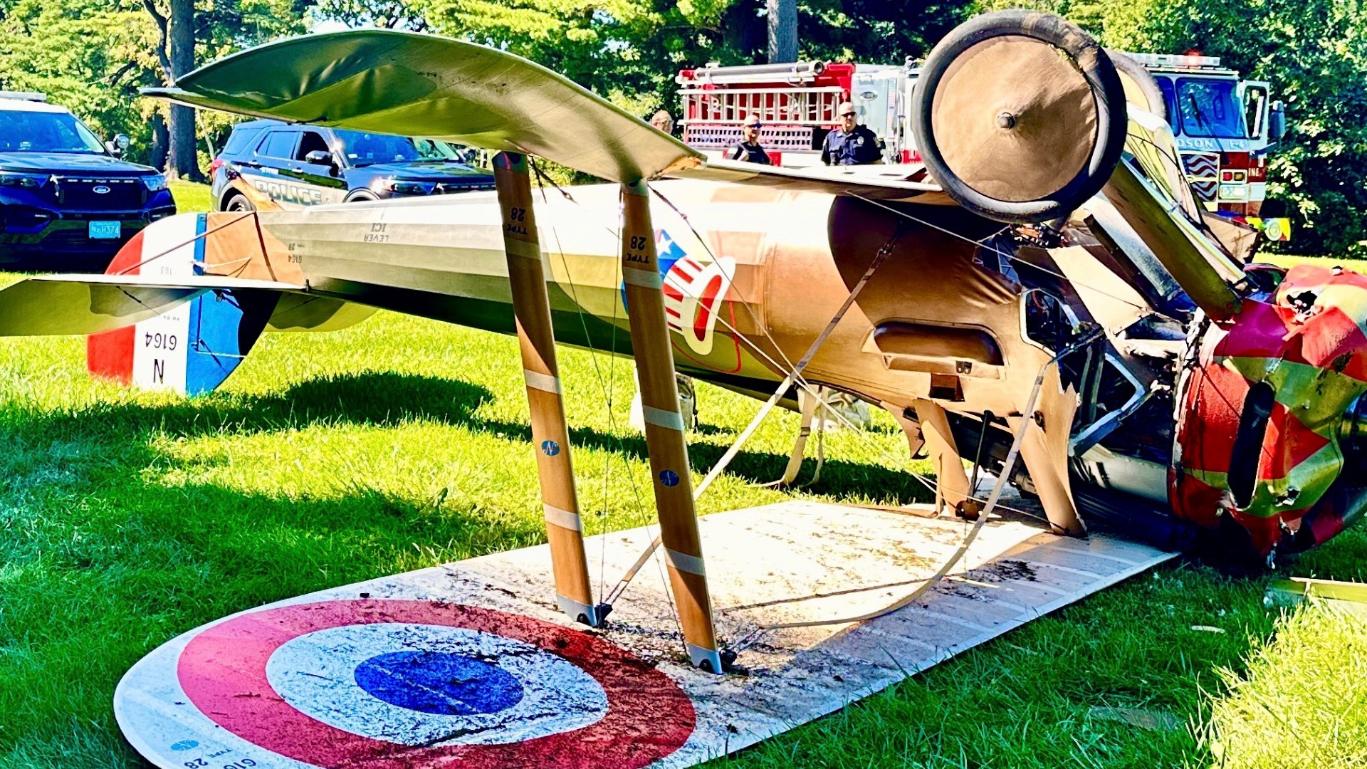 World War I-era plane flips onto roof trying to land in Stow ...