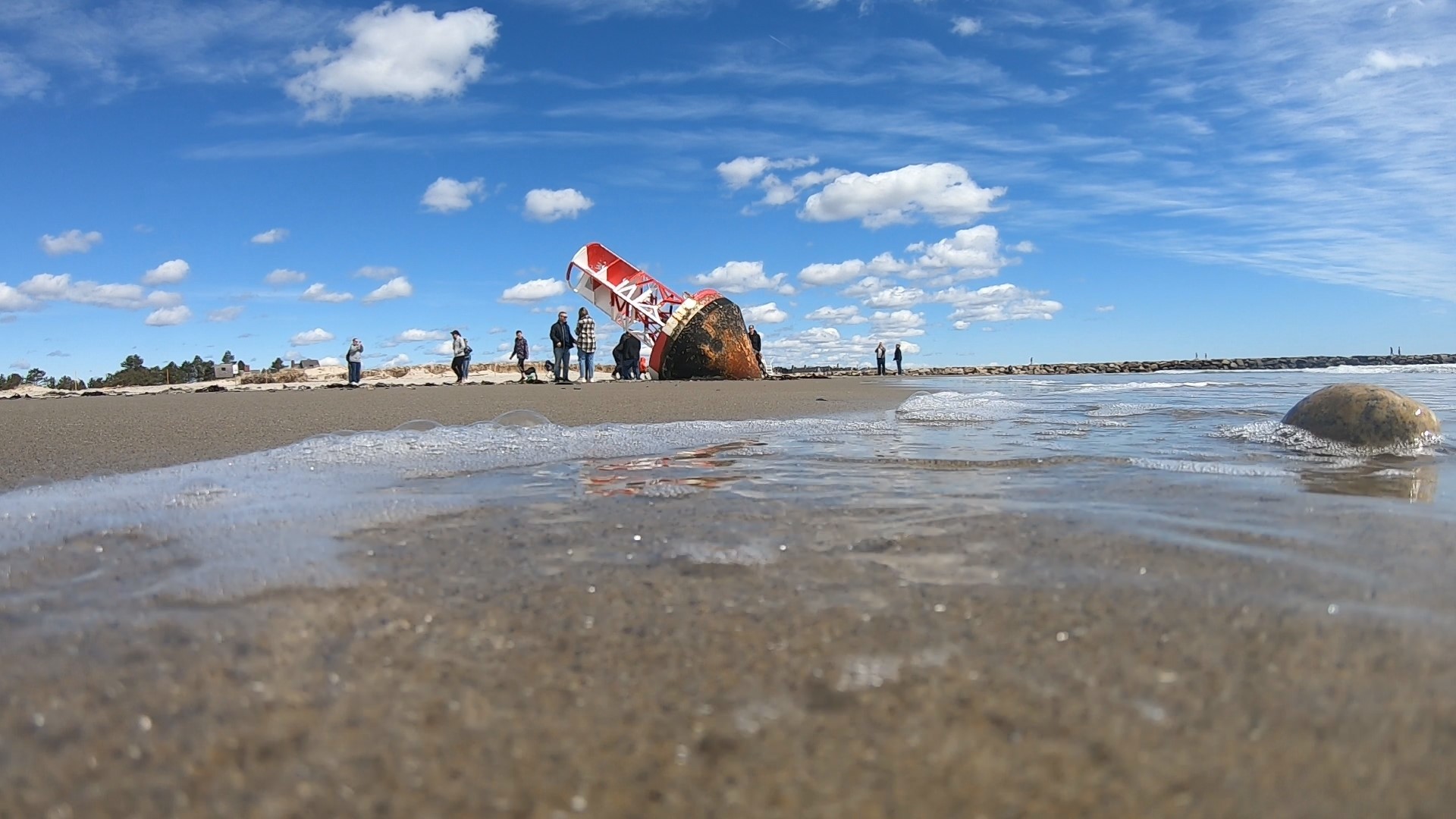 Wells Beach buoy wash-up catches beachgoers' attention ...