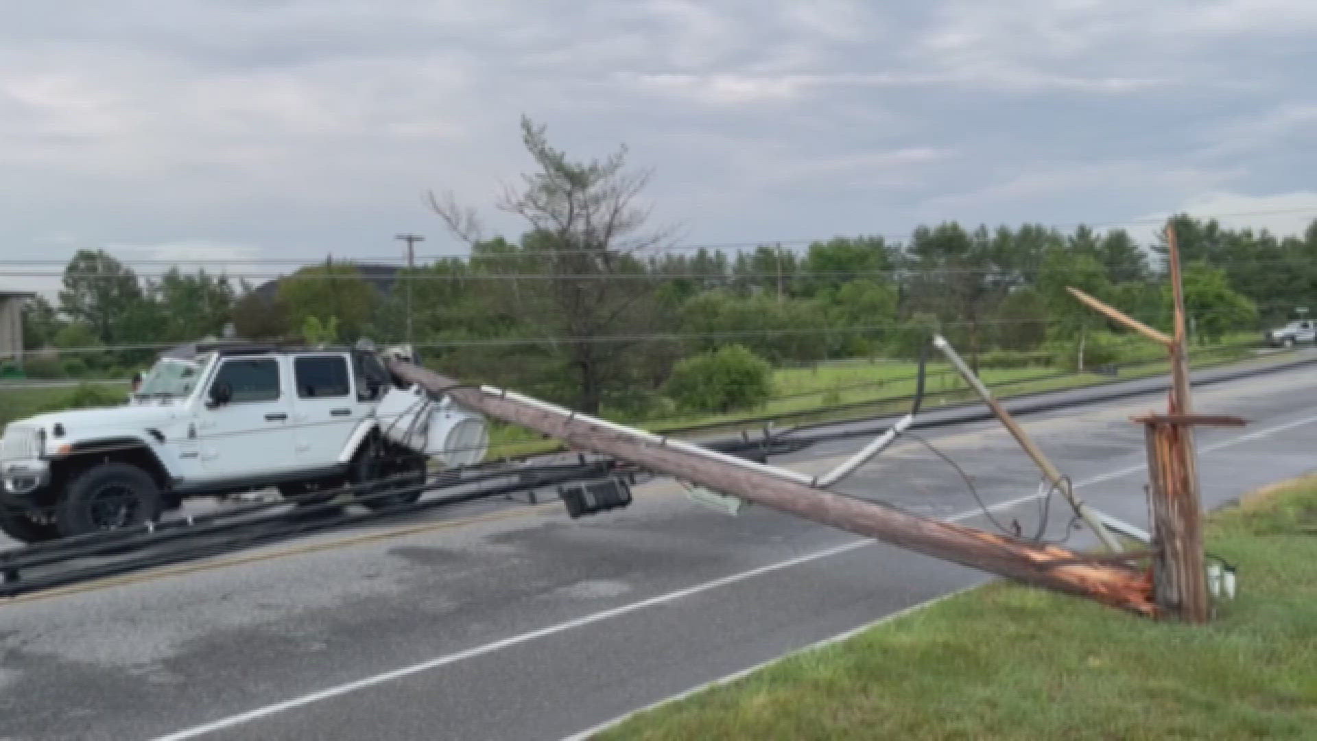 Utility pole falls on top of car during strong winds in Scarborough ...