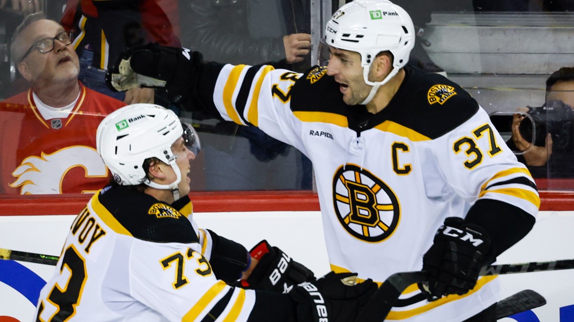 NHL scores: Boston Bruins beat Calgary Flames for 8th win a row ...