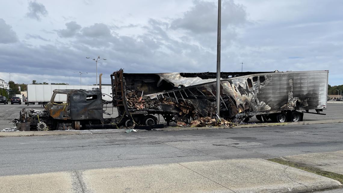 Burned tractor trailer truck still sits in parking lot ...