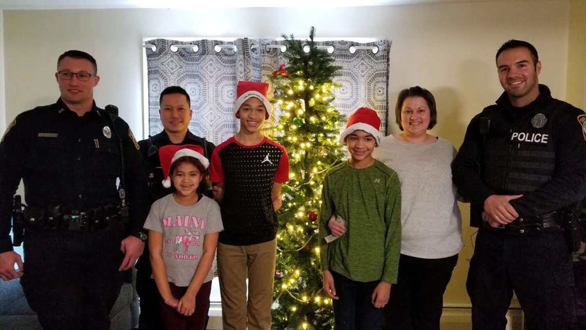 Police officers and TIP volunteers deliver Christmas cash to families ...