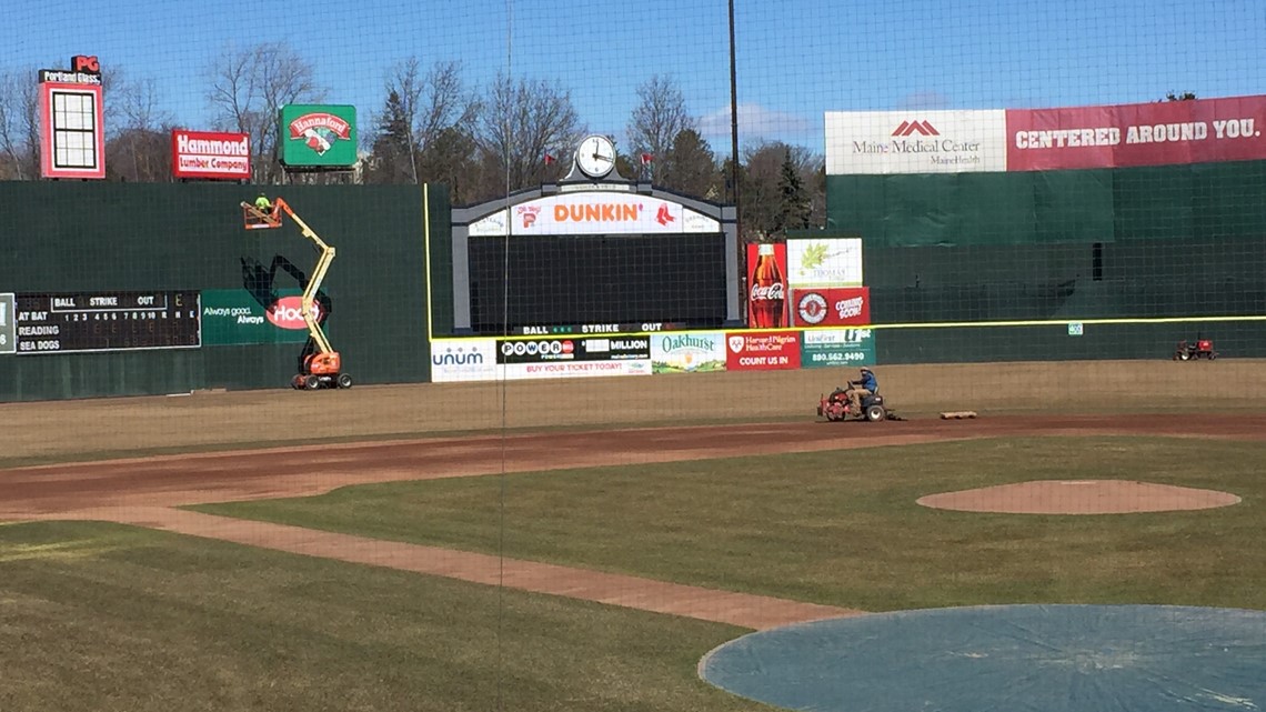 Play ball! Last minute work takes place before opening day at Hadlock ...
