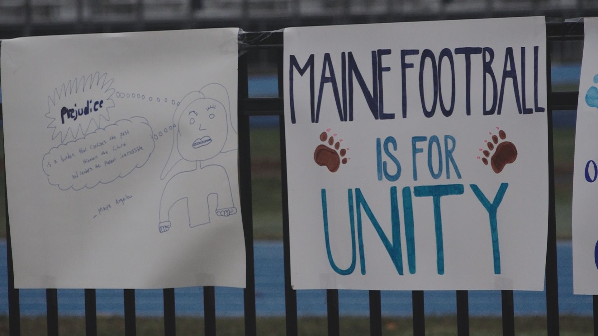 The University of Maine football team hung sings of unity Friday ...