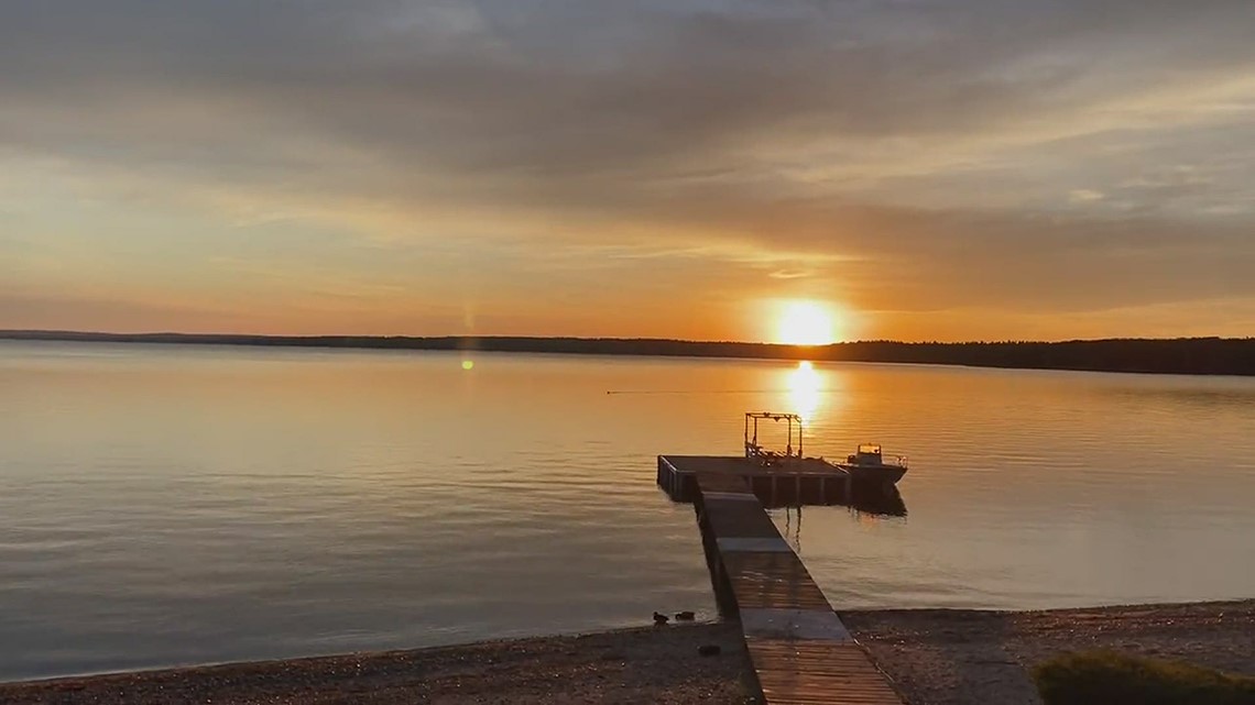 Deer swimming in Maine's Sebago Lake at sunrise | newscentermaine.com